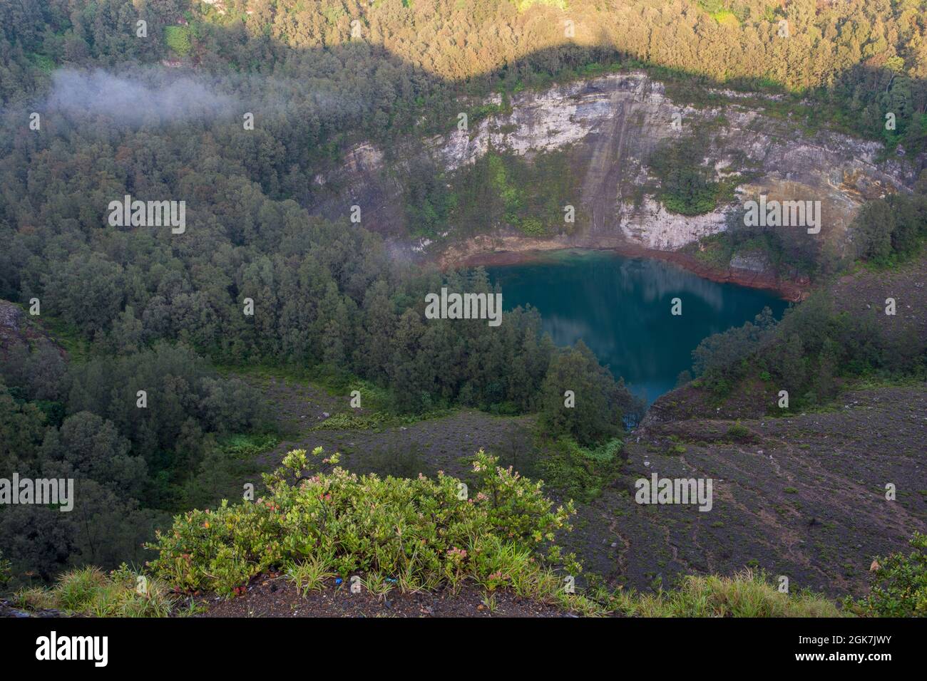 One of the thre Kelimutu Lakes is Tiwu Ata Bupu (Lake of Old People ...