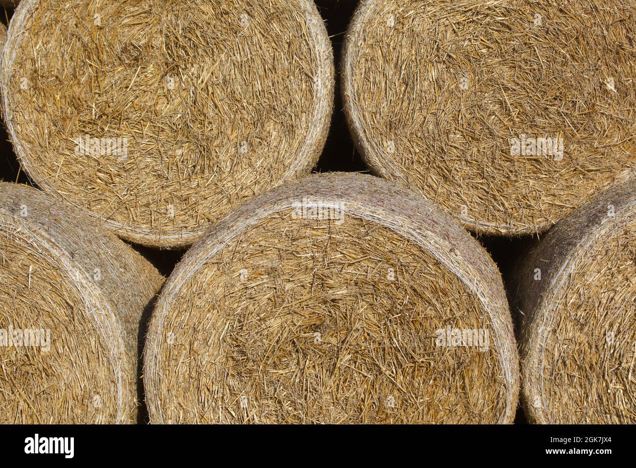 Straw rolls, stacked in a pyramid. Close-up shot Stock Photo - Alamy