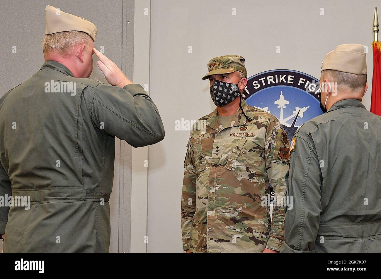 Capt. Robert Betts (left), salutes Air Force Lt. Gen. Eric Fick, F-35 ...