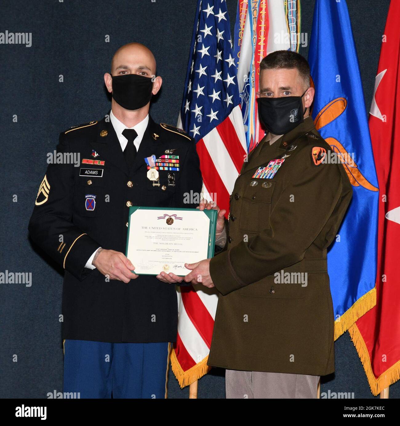 U.S. Army Staff Sgt. Travis M. Adams, who serves as a flight medic with ...