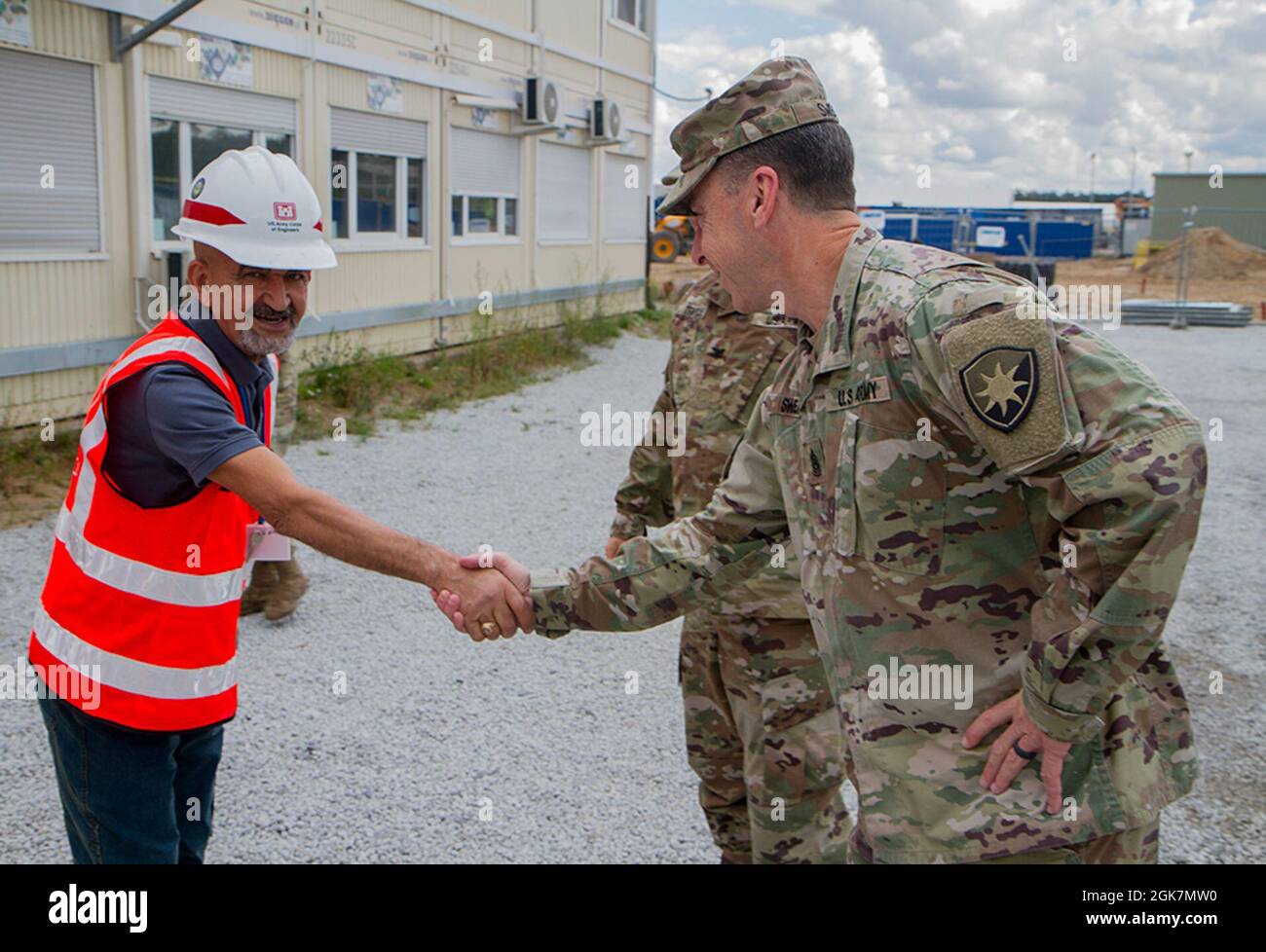 Mehdi Mizani (left), resident engineer with the U.S. Army Corps of ...