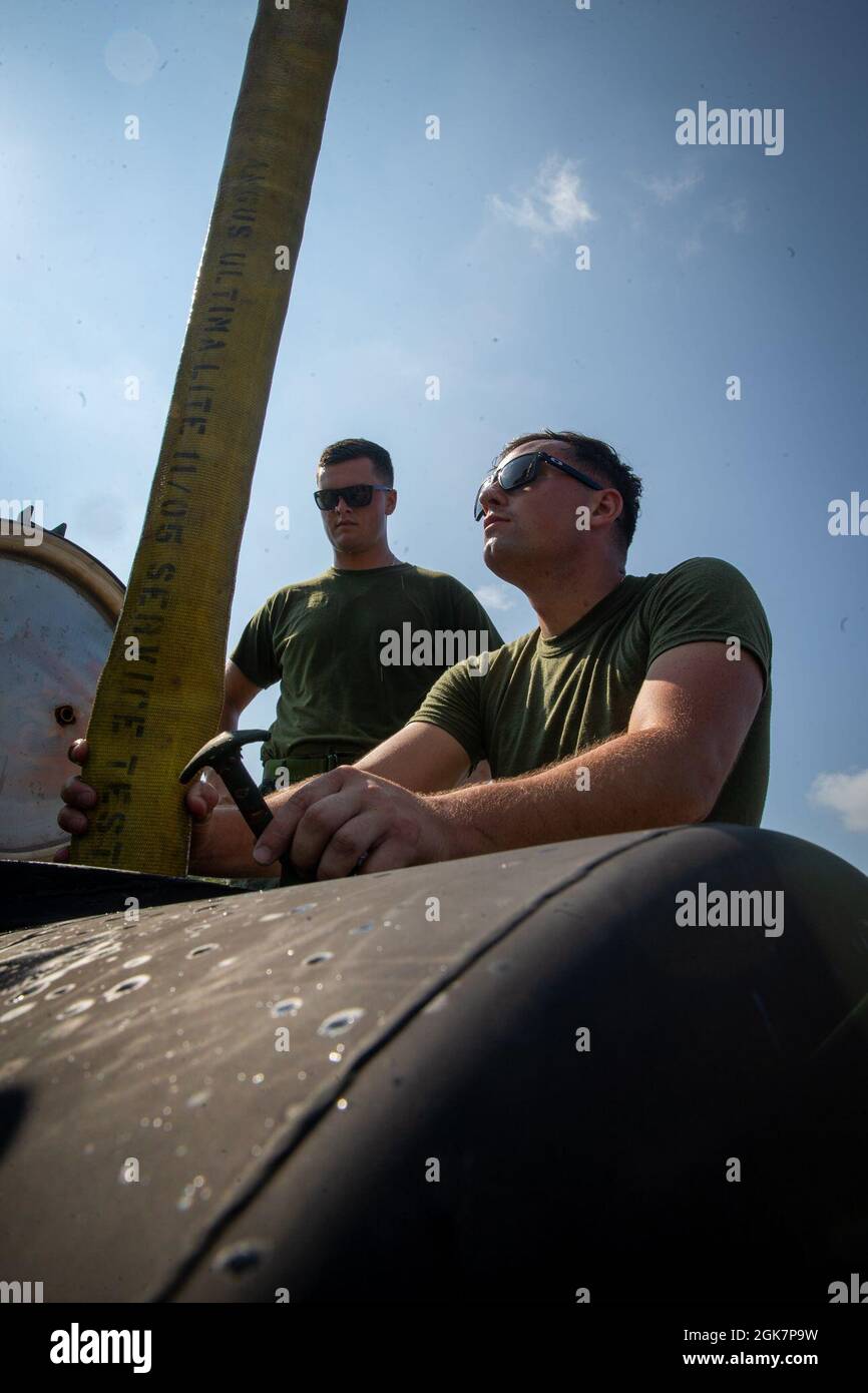 U.S. Marine Corps Cpl. Matthew Cowan, a motor vehicle operator with ...