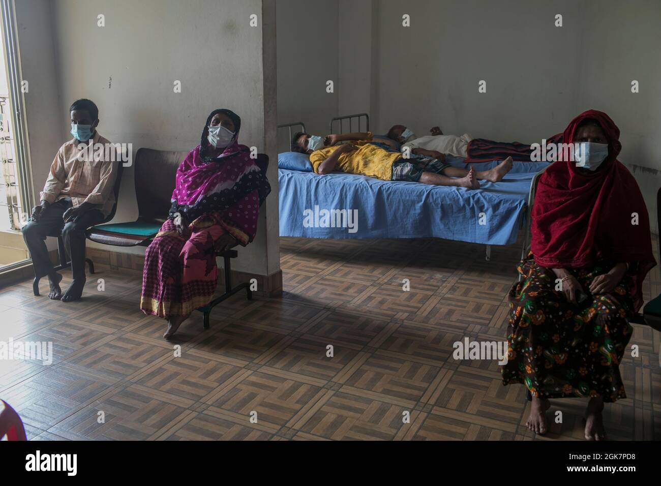 Patients wait to be examined during the Free Medical Eye Camp at ...
