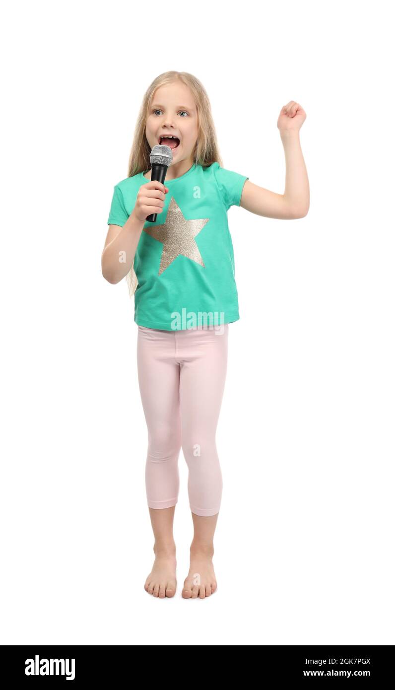 Cute funny girl with microphone on white background Stock Photo - Alamy