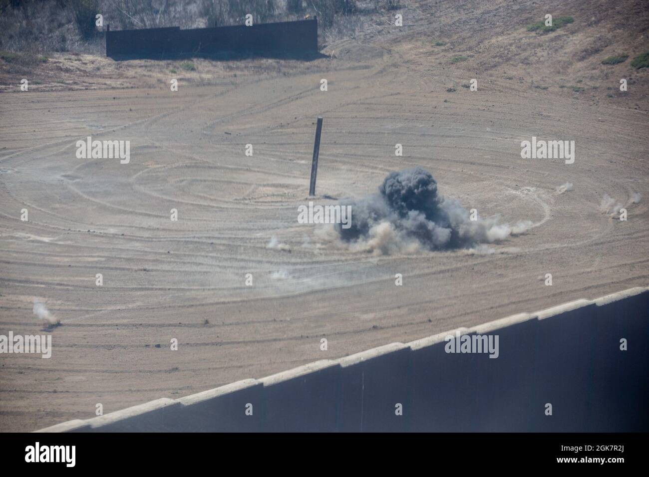 An M67 fragmentation grenade thrown by a Marine with Marine Air Control ...