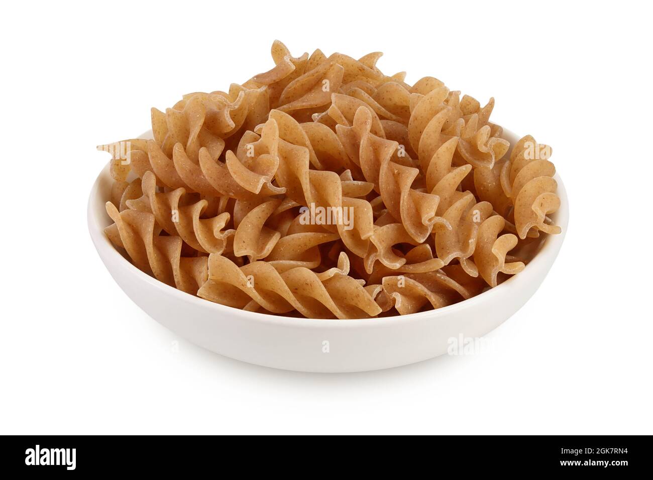Wolegrain fusilli pasta from durum wheat in bowl isolated on white ...