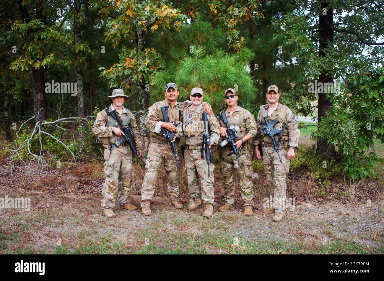 Members of ‘All Guard - Team Bravo’ pose for a photo at the 50th ...