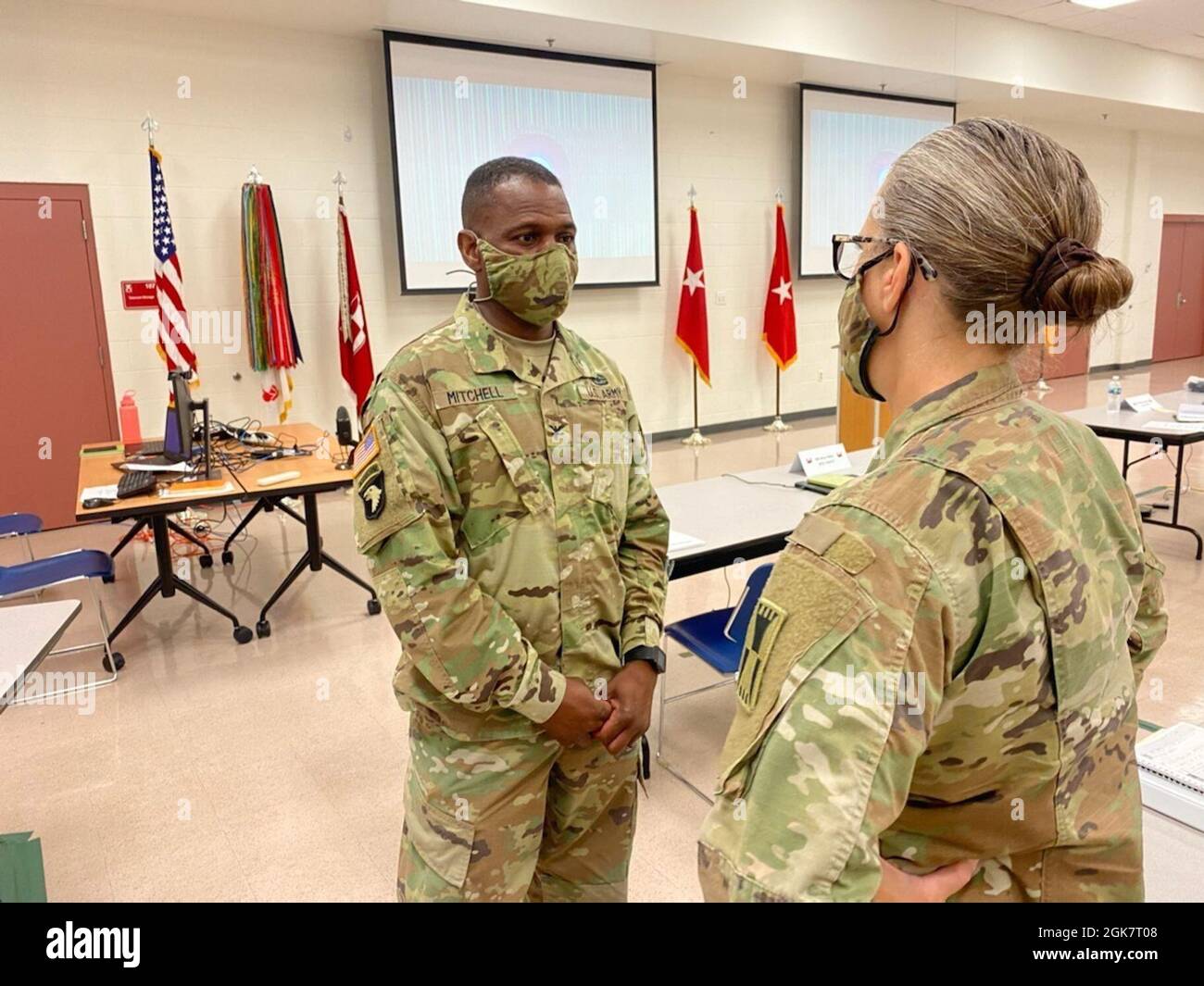 On left, Col. Louis Mitchell, G-3, 412th Theater Engineer Command (TEC ...