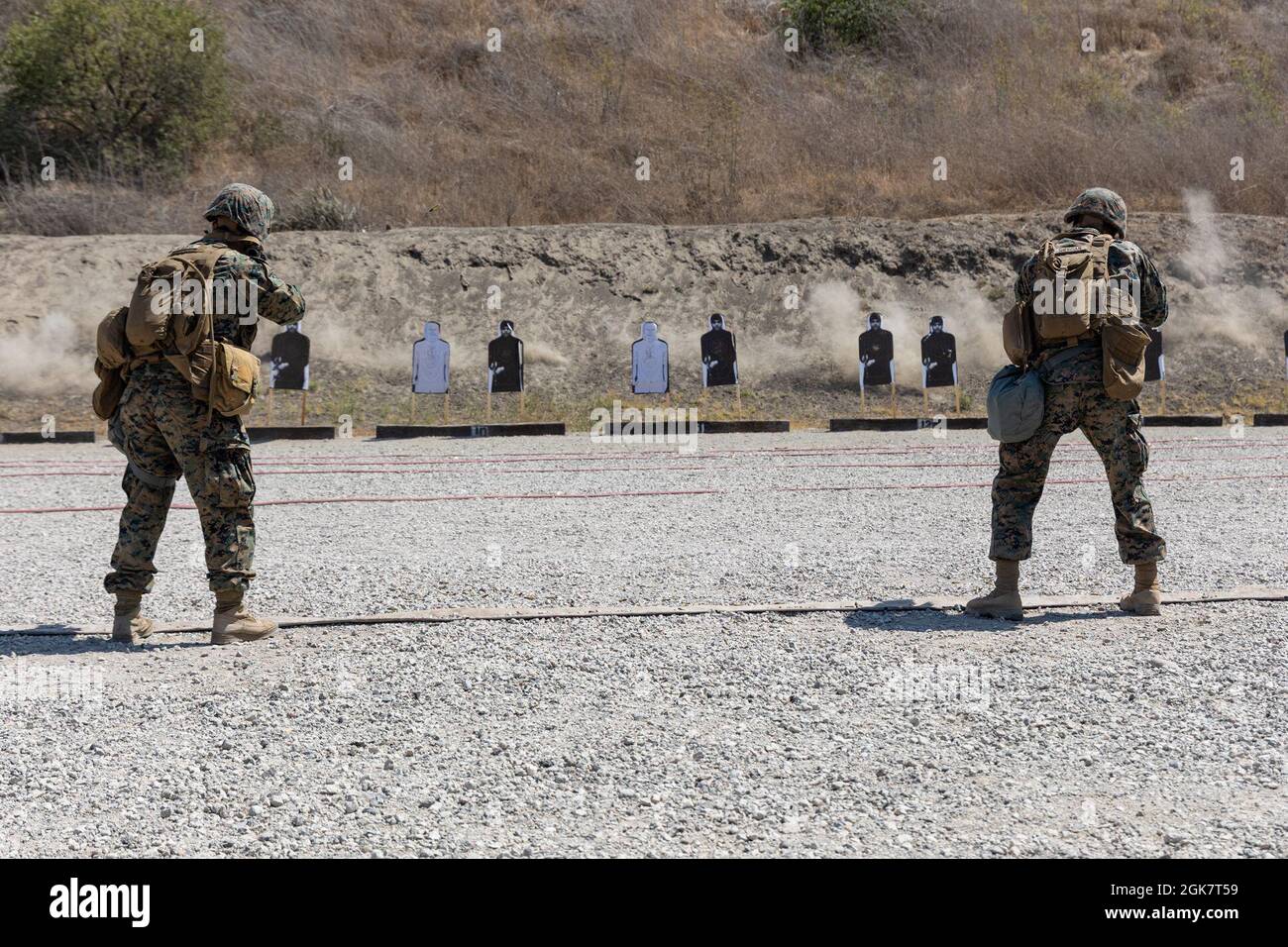U.S. Marines 1st Lt. Adam Acquista (left), an air defense control ...