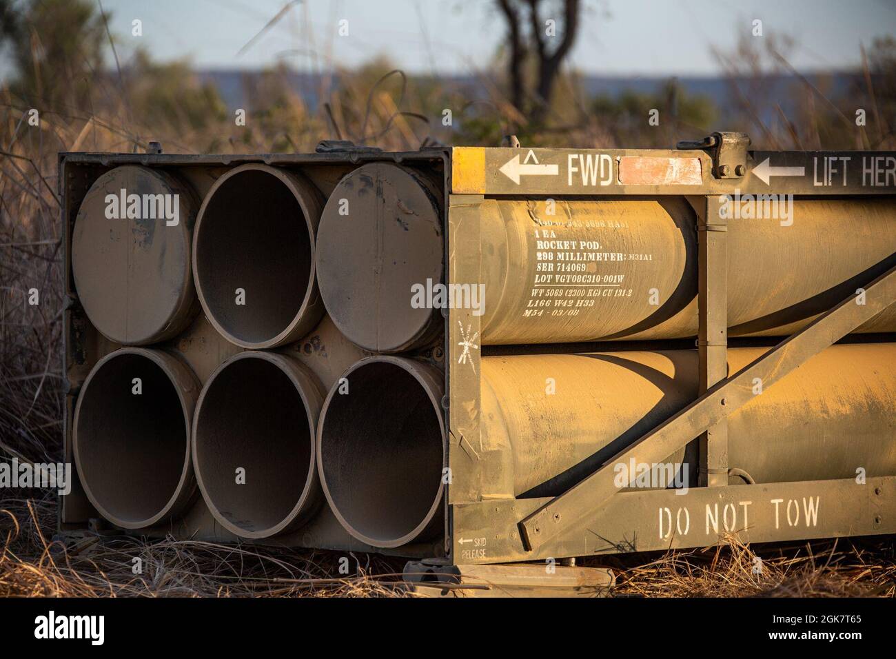 Guided Multiple Launch Rocket Systems are staged on the ground before ...