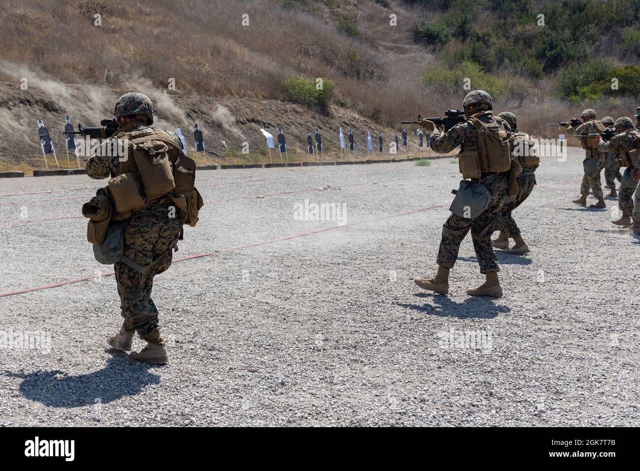 U.S Marines with Marine Air Control Squadron 1 (MACS-1) fire M4 carbine ...