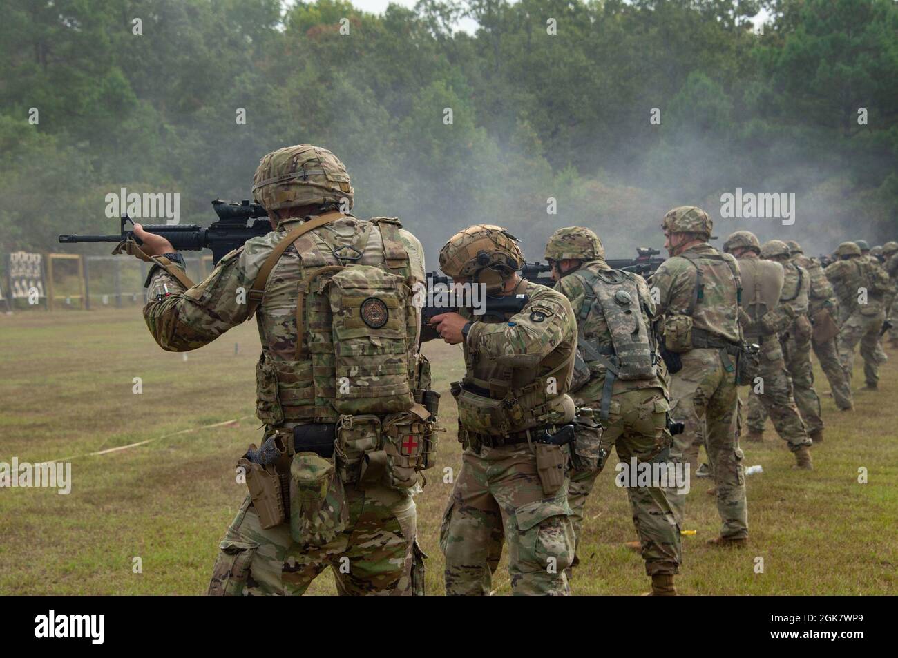 Competitors engage their targets on the firing line during the ...