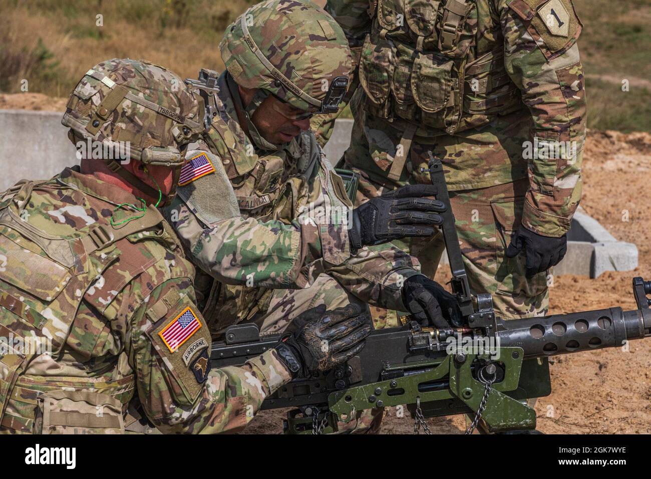 Staff Sgt. Gary Bass (left) and Staff Sgt. Stanley Ukalovich (middle ...