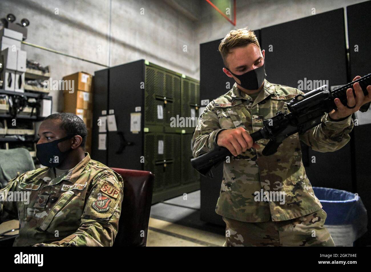 U.S. Air Force Staff Sgt. Eric Darling, left, 18th Logistics Readiness ...