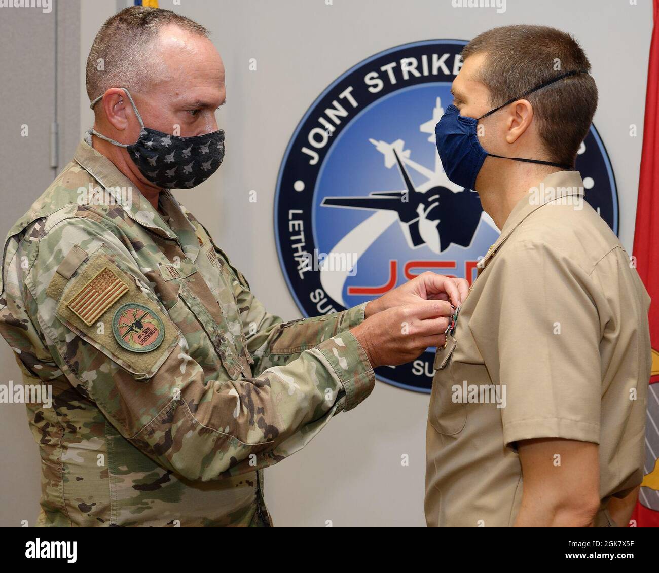 Lt. Gen. Eric Fick, F-35 Joint Program Executive Officer, pins Lt Cmdr ...
