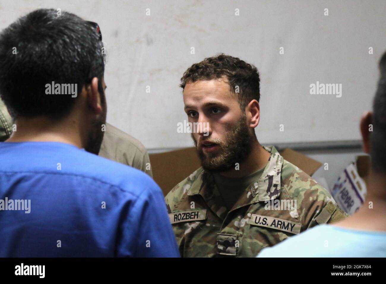 U.S. Army Spc. Toraj Rozbeh, an Information Operations Specialist ...