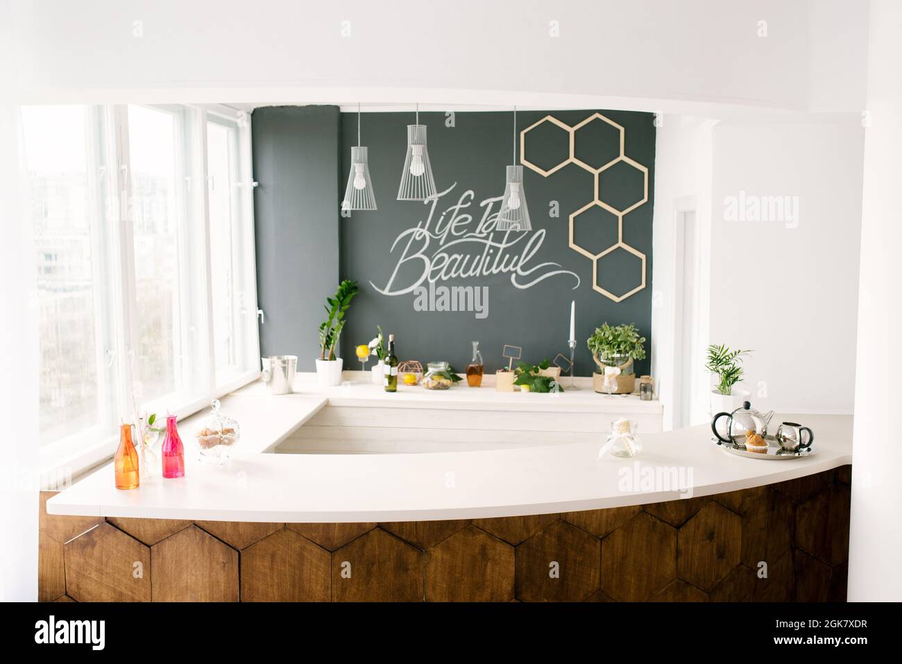 Stylish modern bar counter decorated with wooden tiles in the living ...