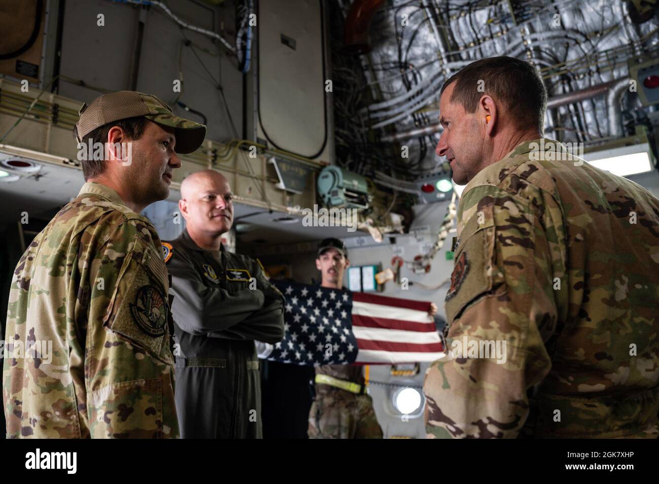 Col. John F. Robinson, 911th Airlift Wing commander, talks with an ...