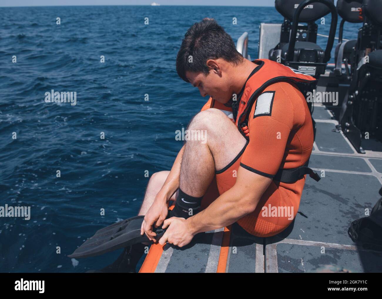 U.S. Coast Guard Seaman Jaiden Hartley, a rescue swimmer aboard Coast ...