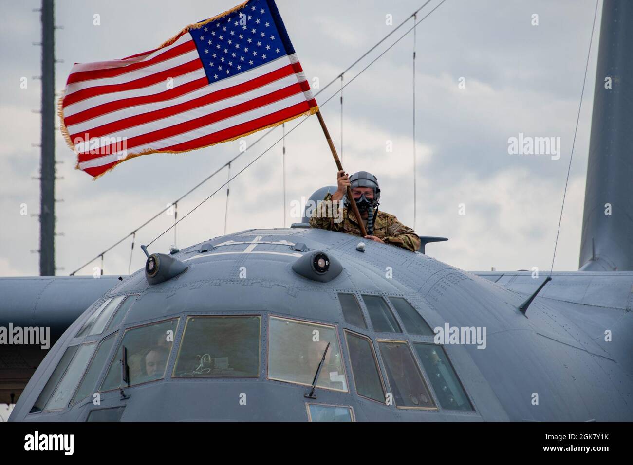 A U.S. Air Force Airman waves the United States Air Force flag at Davis ...