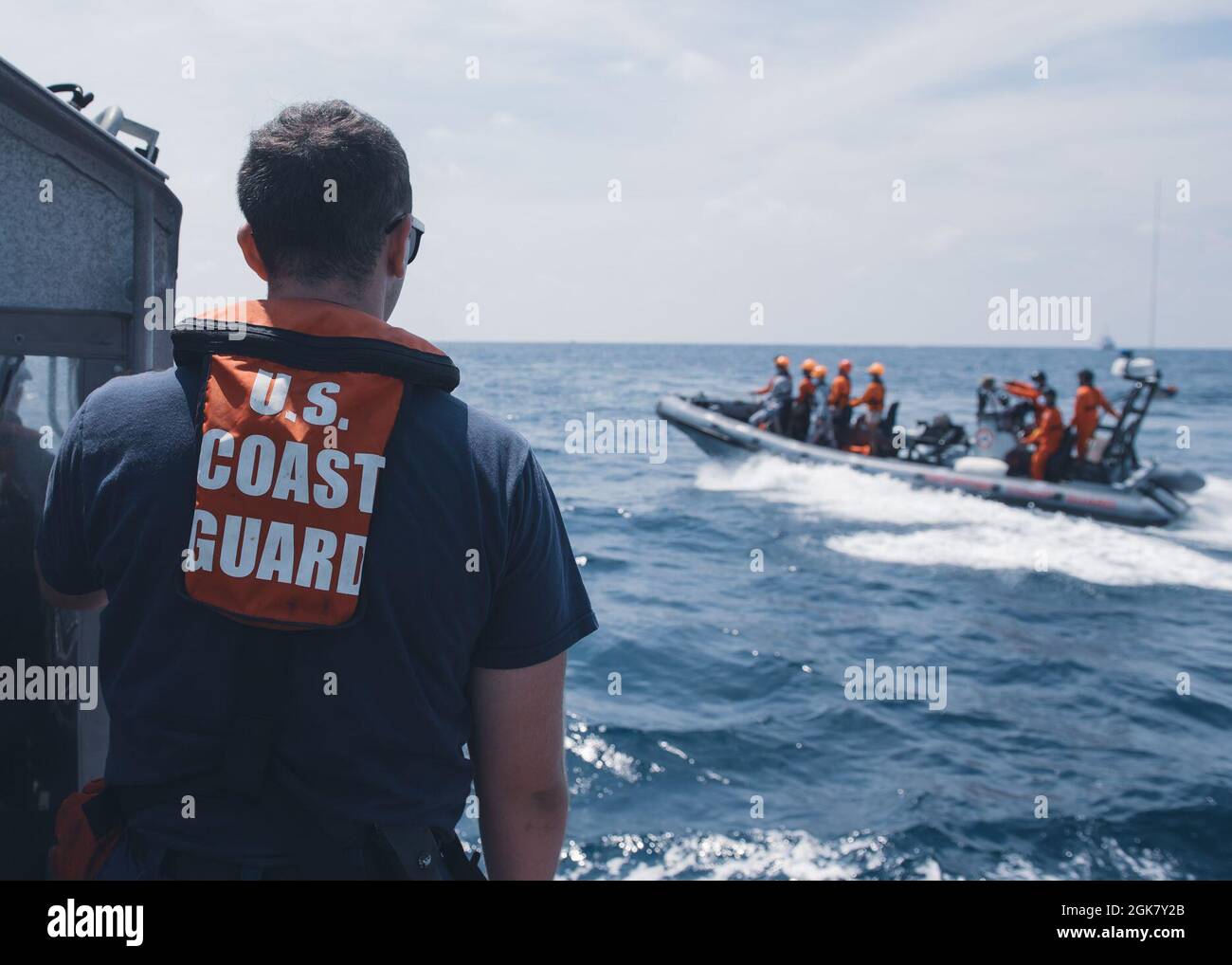 U.S. Coast Guard Petty Officer 3rd Class Ethan Dorais, a boatswains ...