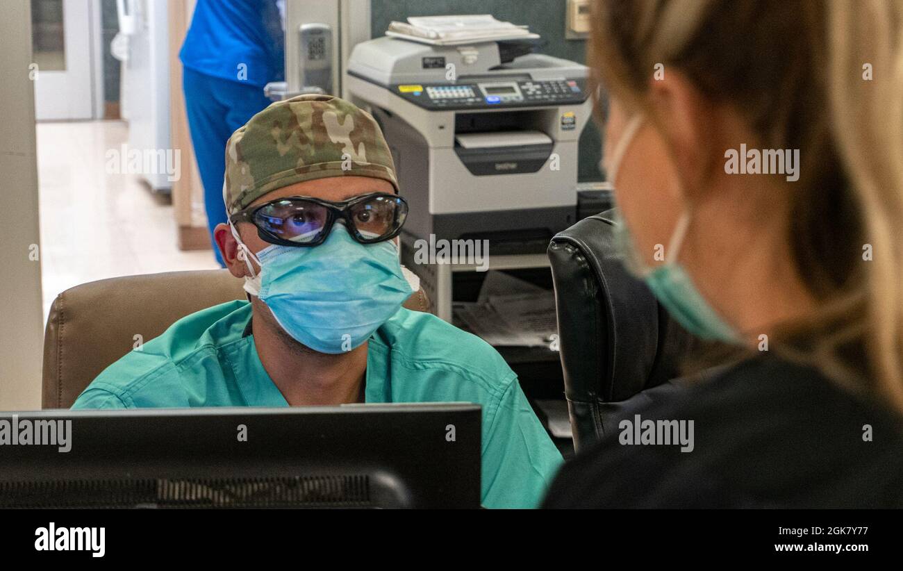 ALEXANDRIA, La. -- U.S. Air Force Capt. Luis Dixon, left, an emergency ...