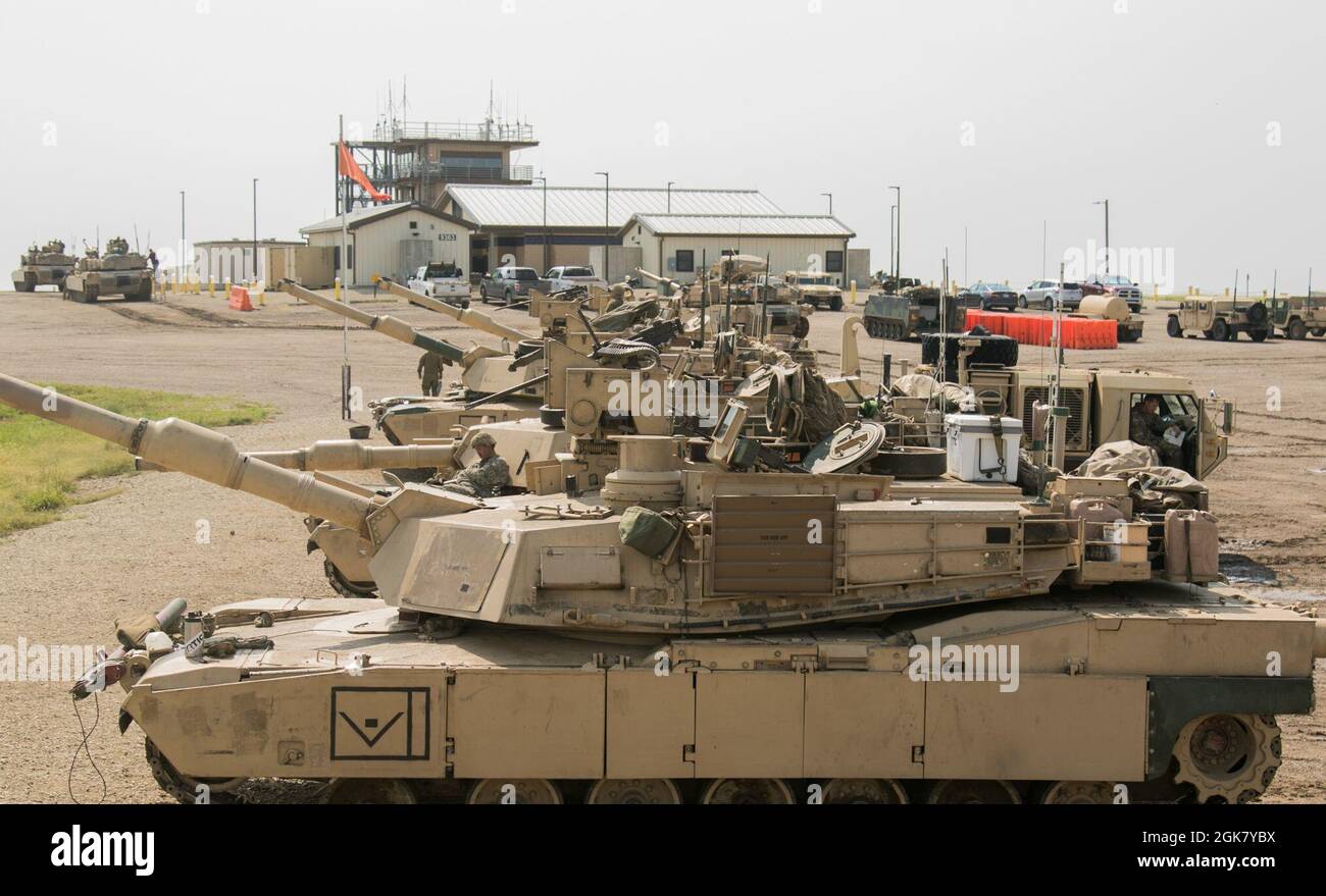 Tankers from the 1st Combined Arms Battalion, 63rd Armor Regt. prepare ...