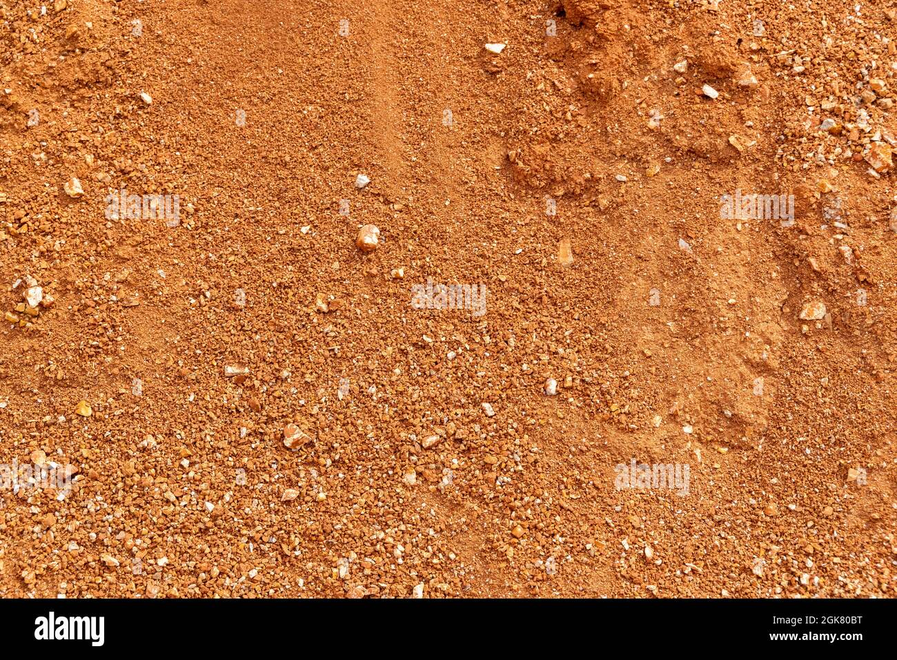 Ground surface texture, red soil background Stock Photo - Alamy