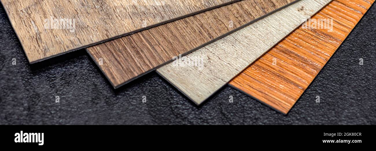 PVC vinyl floor. Samples of vinyl flooring. Collection of vinyl tiles ...