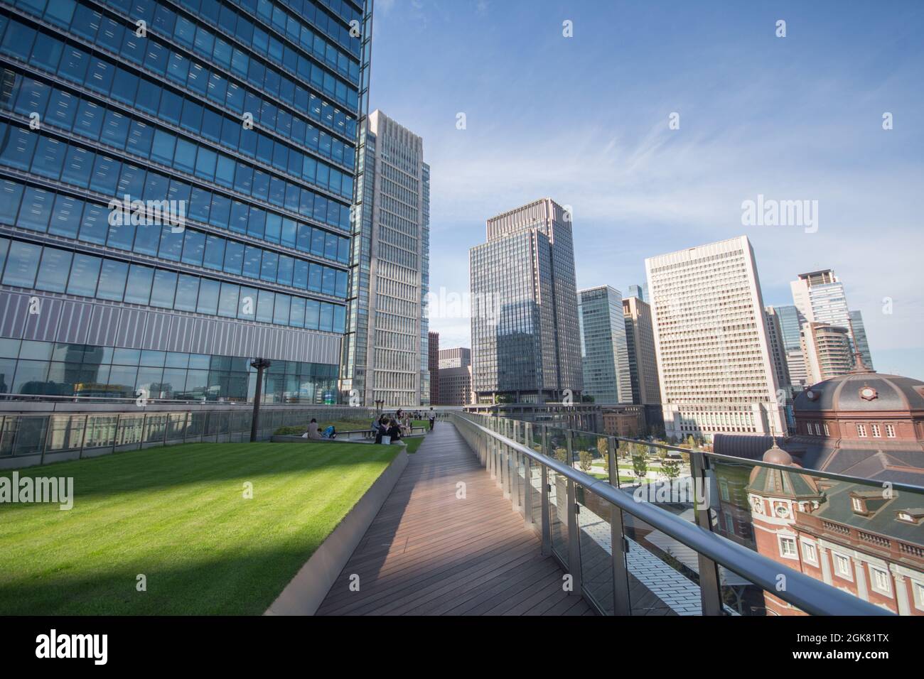 People walking among skyscrapers in Tokyo's CBD, located near to Tokyo ...