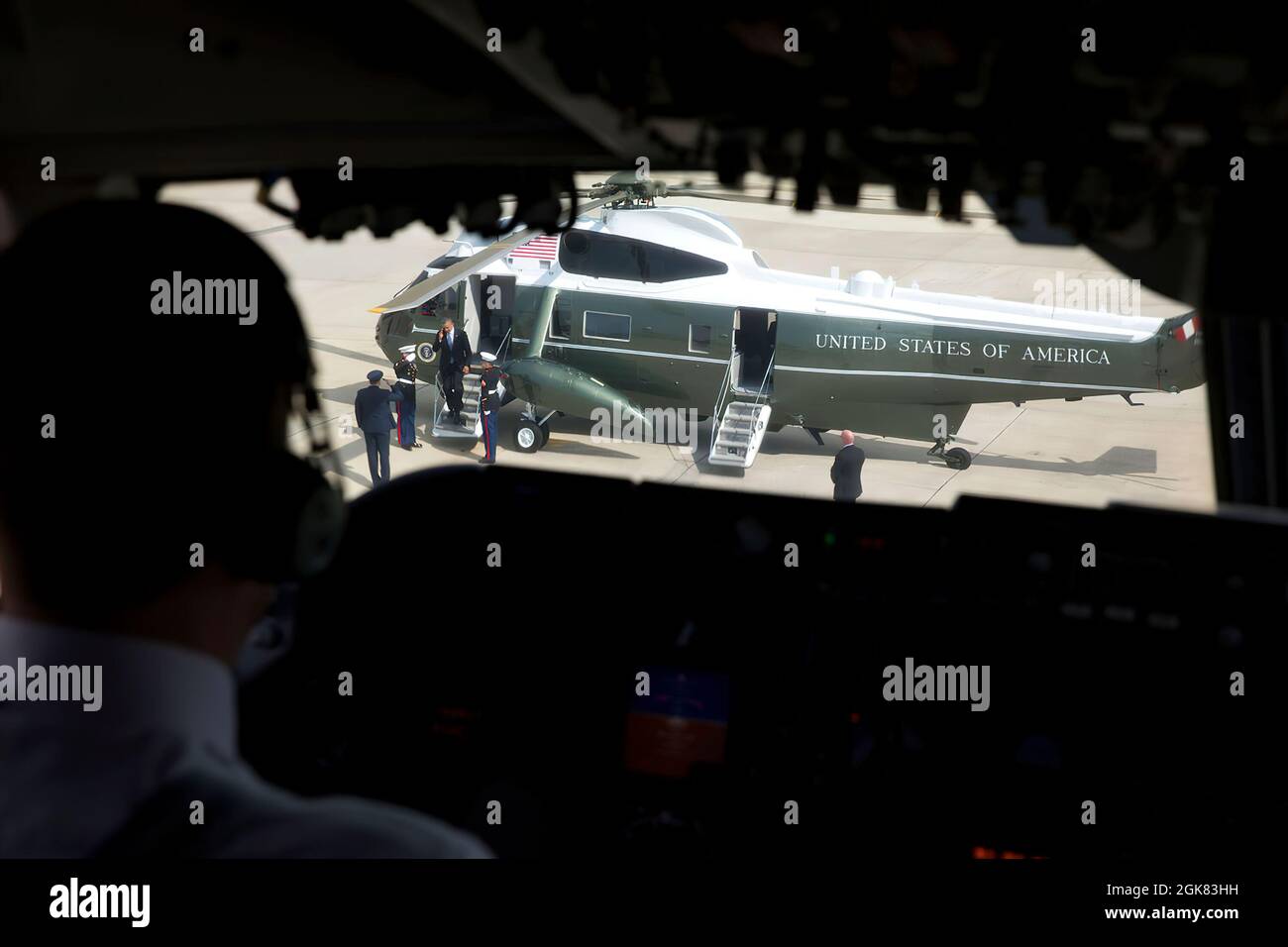 President Barack Obama salutes as he disembarks Marine One, as seen ...