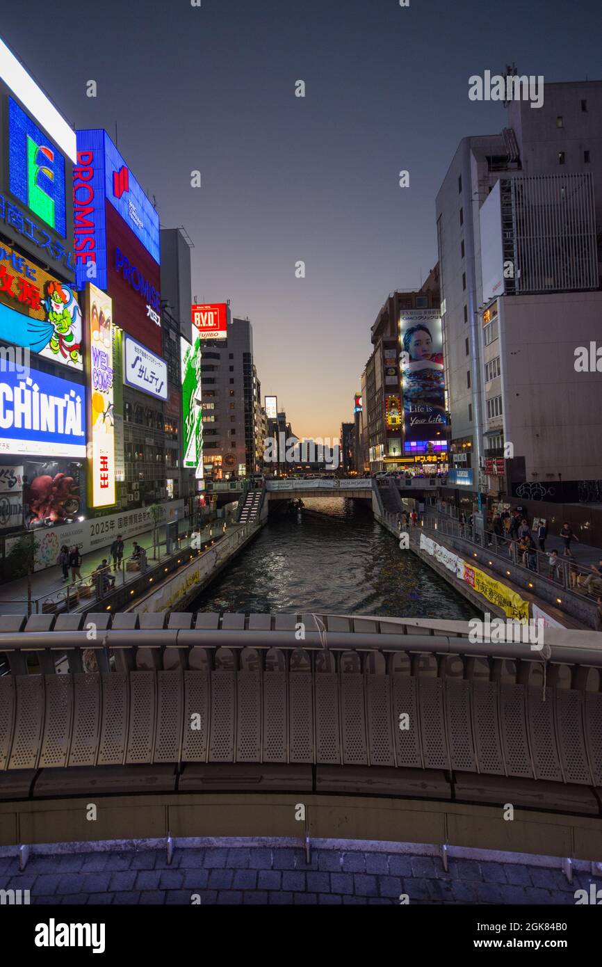 Osaka reflected in the Dotonbori river at twilight, Japan Stock Photo ...