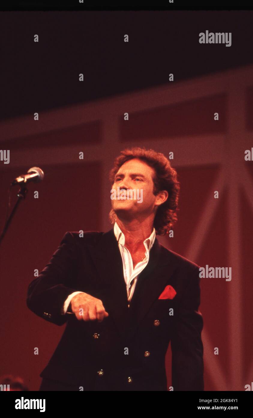 ©1990 LARRY GATLIN sings as the Grand Ole Opry comes to Houston, Texas ...
