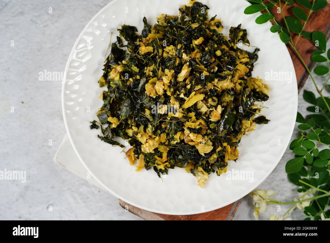 Moringa egg stir fry - healthy side dish with muringa leaves, selective ...