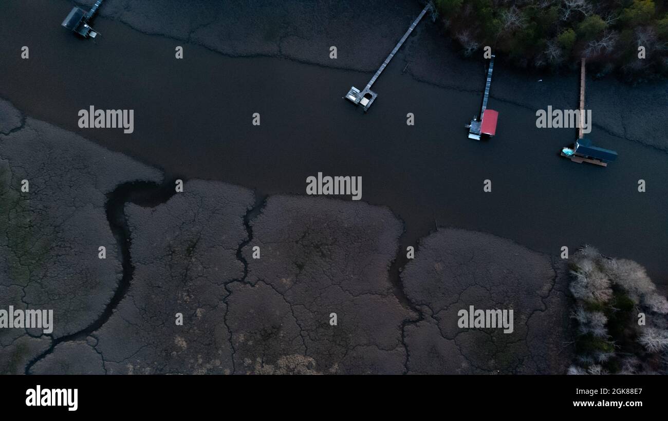 An aerial view of a series of boat houses on the James River in ...