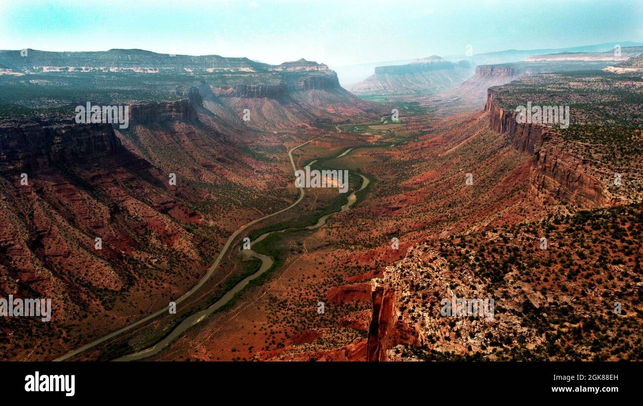 A river and highway road running through a desert canyon in Gateway ...