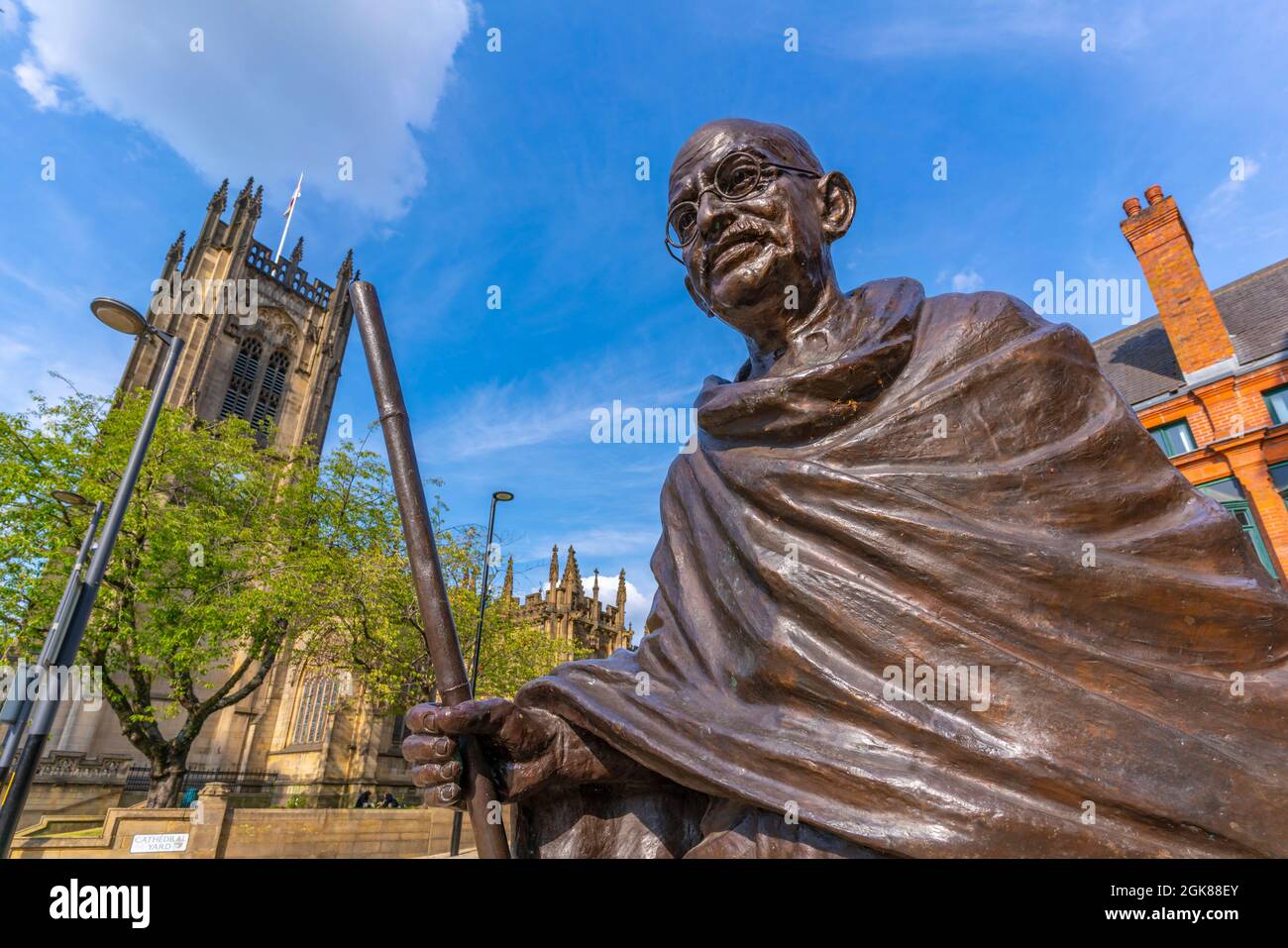View of Manchester Cathedral and Mahatma Gandhi Statue, Manchester ...