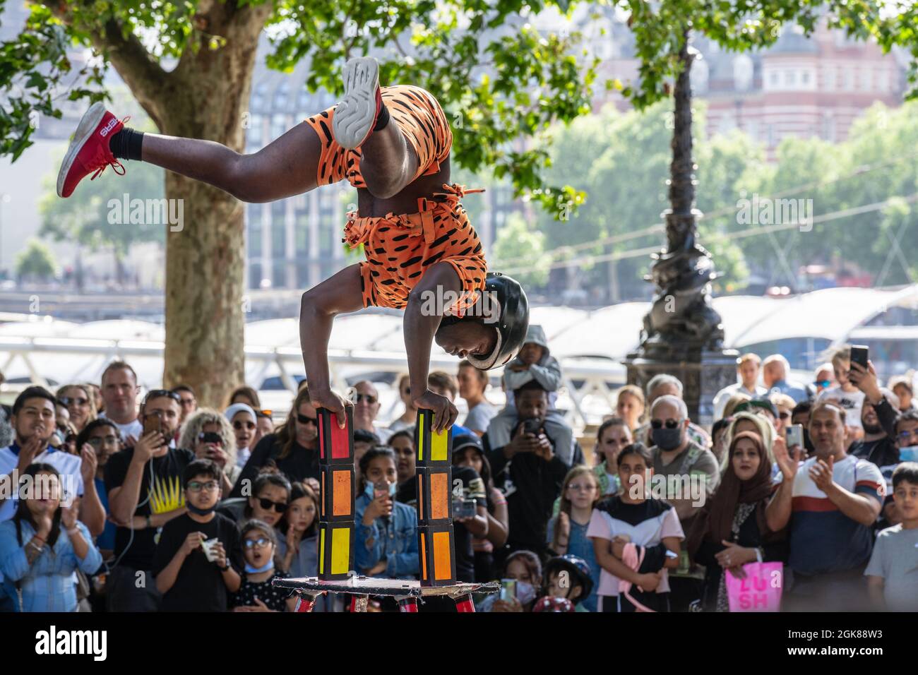 Street performers. Street show in London. UK, London, August 15, 2021 ...