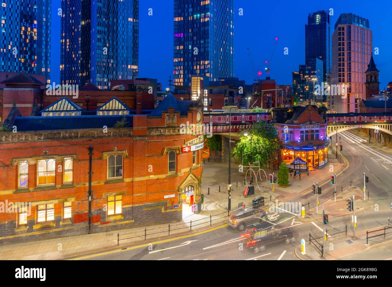 View of Deansgate Station and city skyline at dusk, Manchester ...
