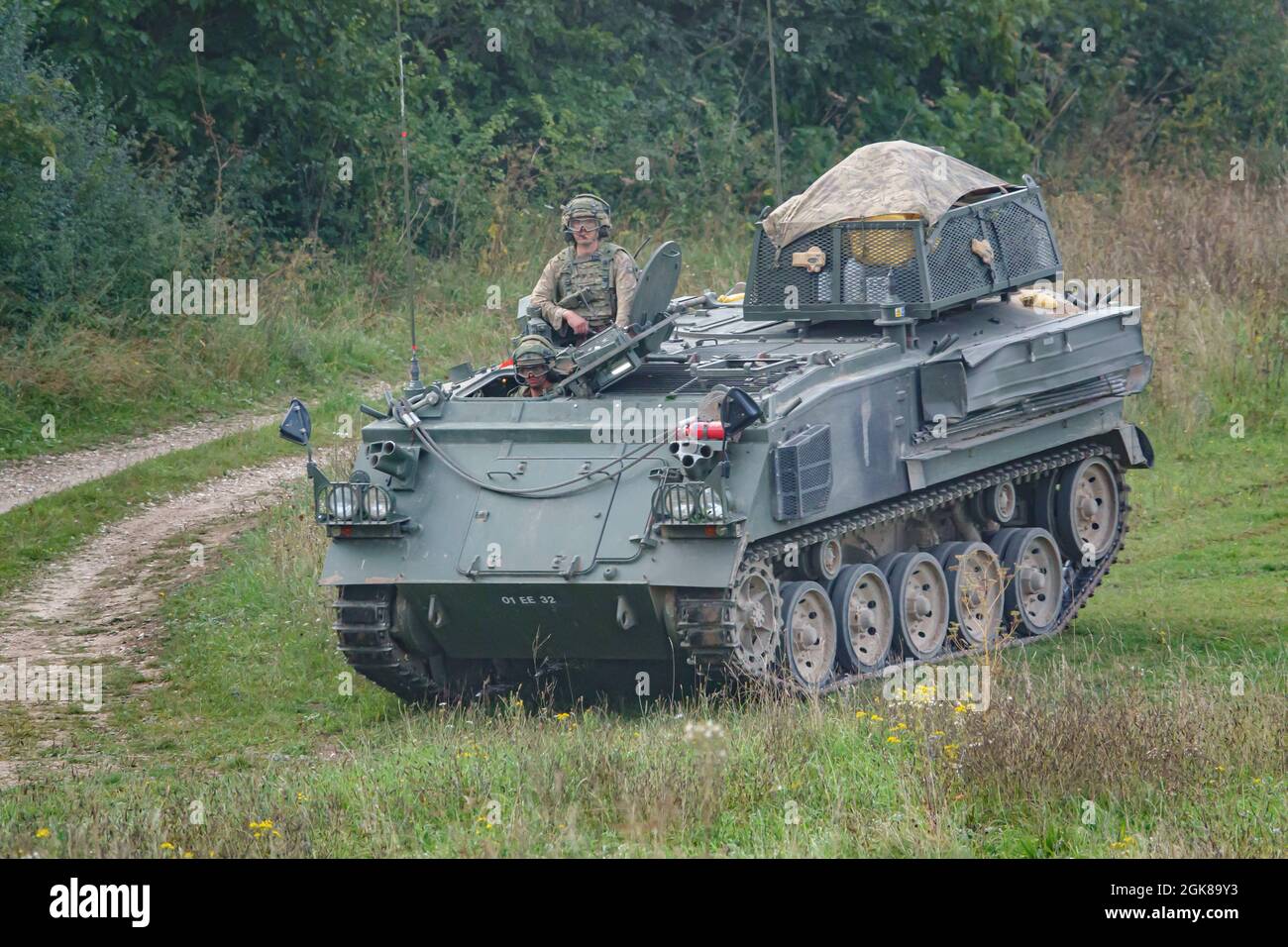 British army FV432 Bulldog armored personnel carrier in action on a ...