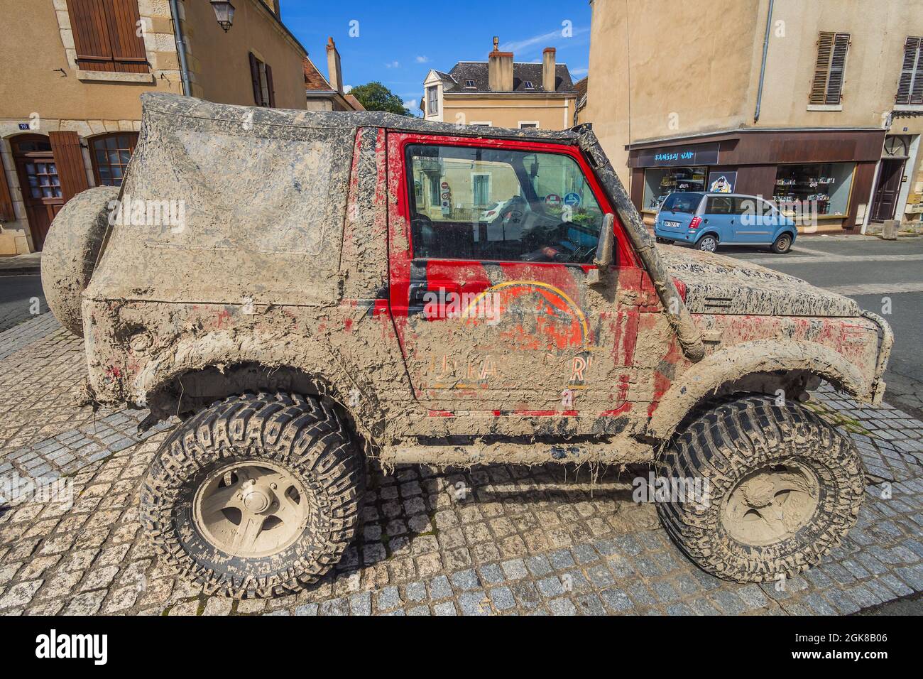 Off-road 4x4 Suzuki Samurai covered in mud - La Chatre, Indre (36 ...