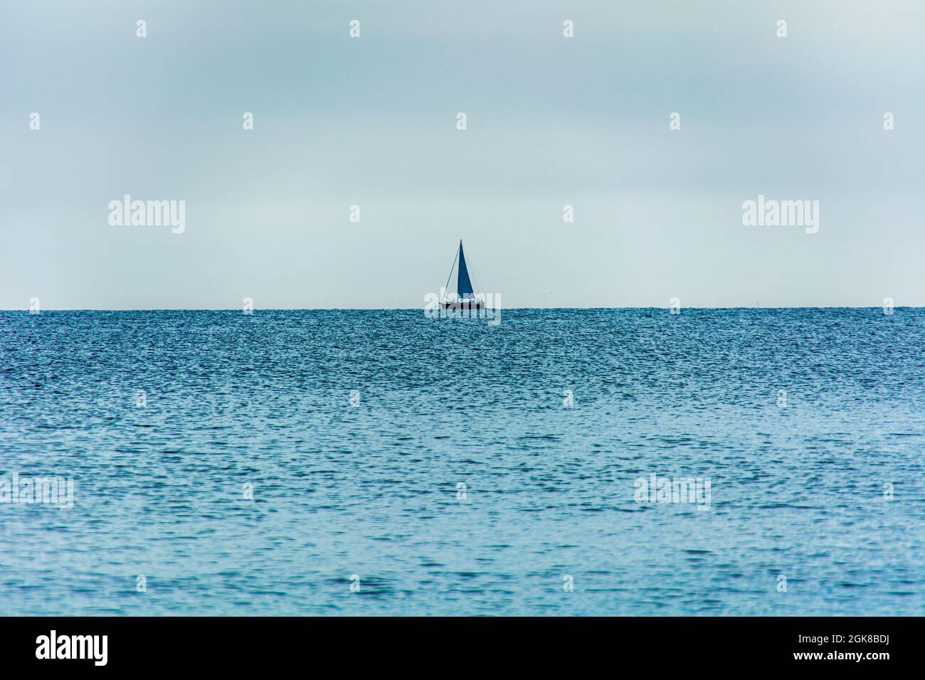 Lonely boat ocean hi-res stock photography and images - Alamy