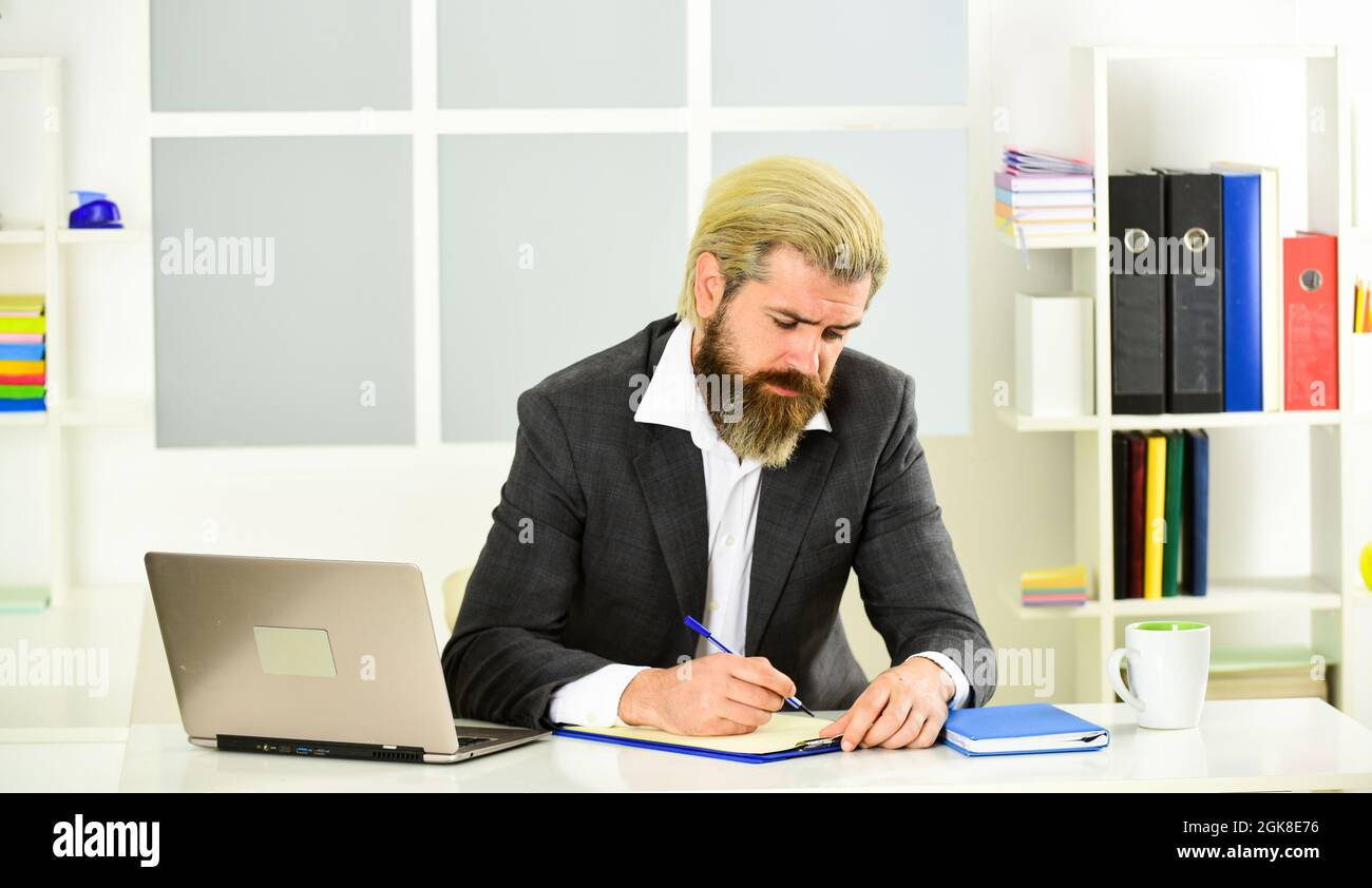 really busy. handsome CEO. Busy mature man in office. Businessman with ...
