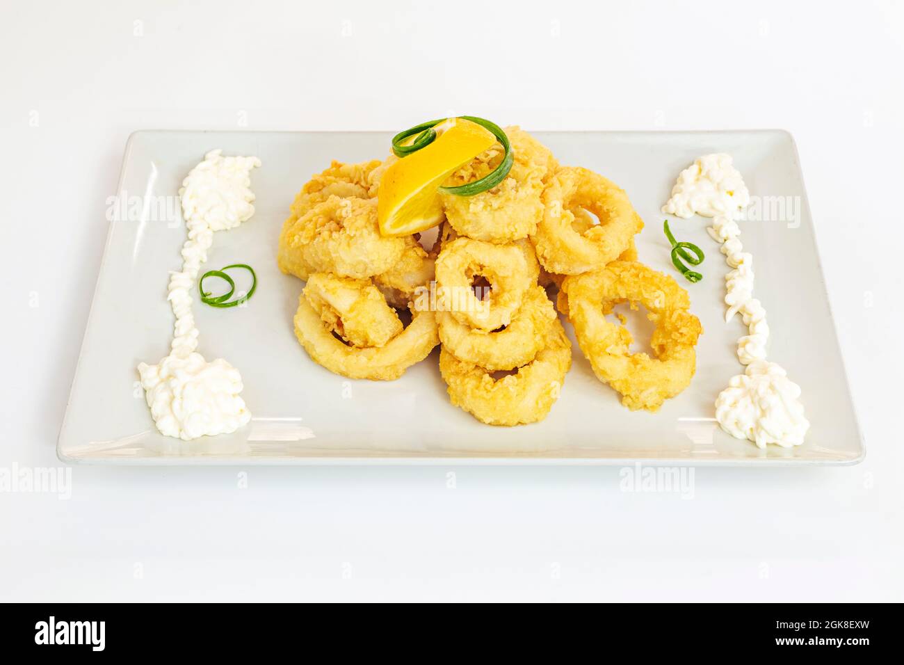 Roman-style battered squid ready to eat in a Spanish tapas restaurant ...