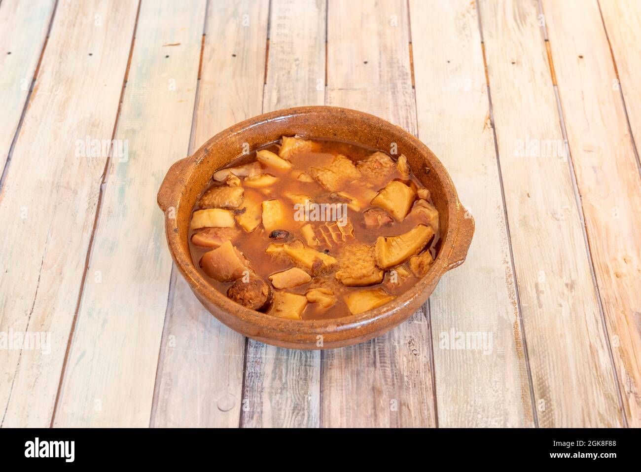 Clay pot of callos a la madrileña with chorizo to serve as a tapa of ...