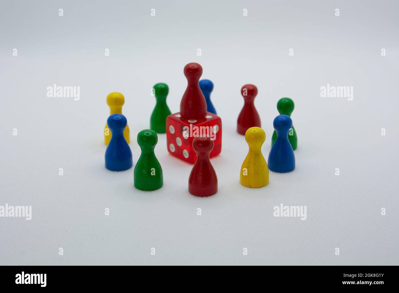 Red leader figure in the center circle of people. Power vertical ...
