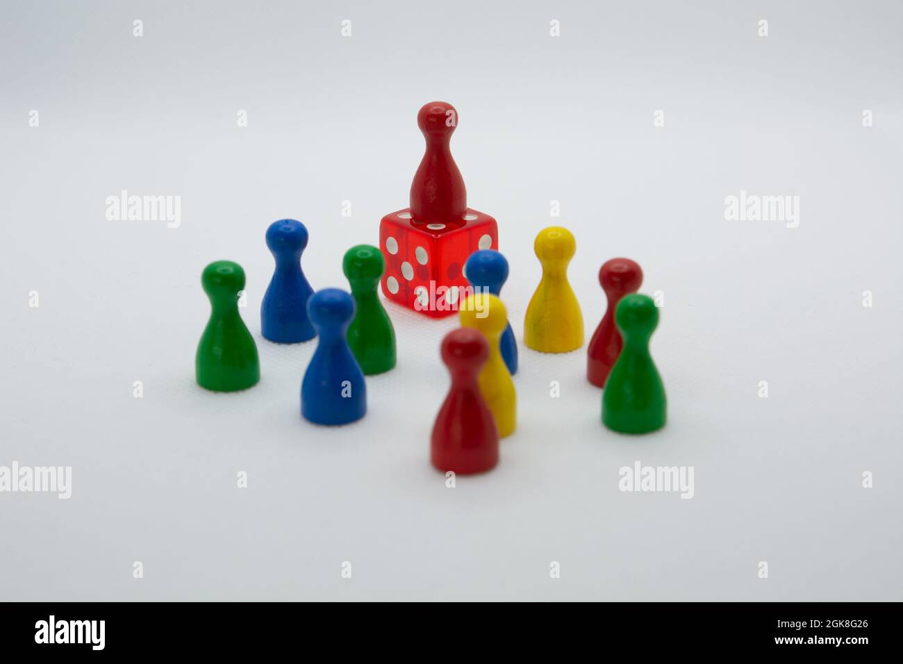 Red leader figure in the center circle of people. Power vertical ...