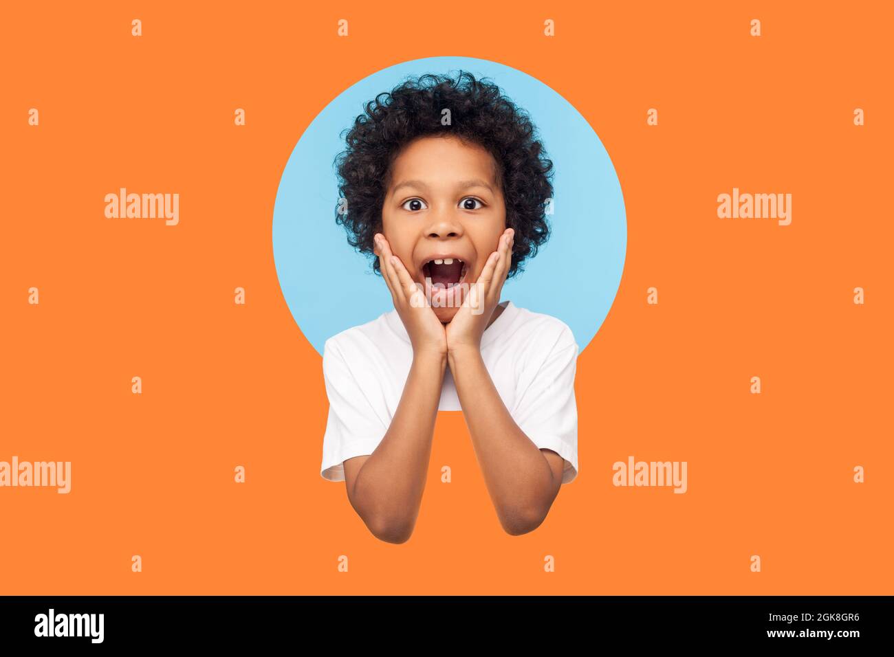 Oh my god, wow! Portrait of amazed boy looking at camera with shocked ...