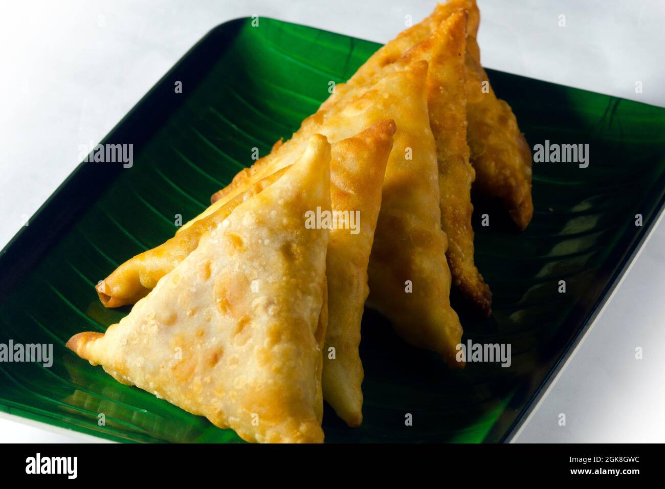 Street Food Collection -vegetable samosa in plate- Asian Kitchen Stock ...
