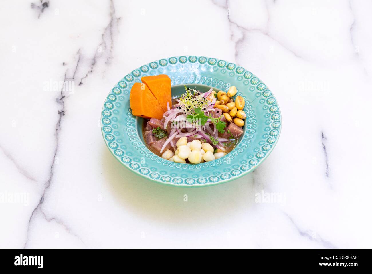 Red tuna ceviche with all the typical condiments of Peruvian fish ...